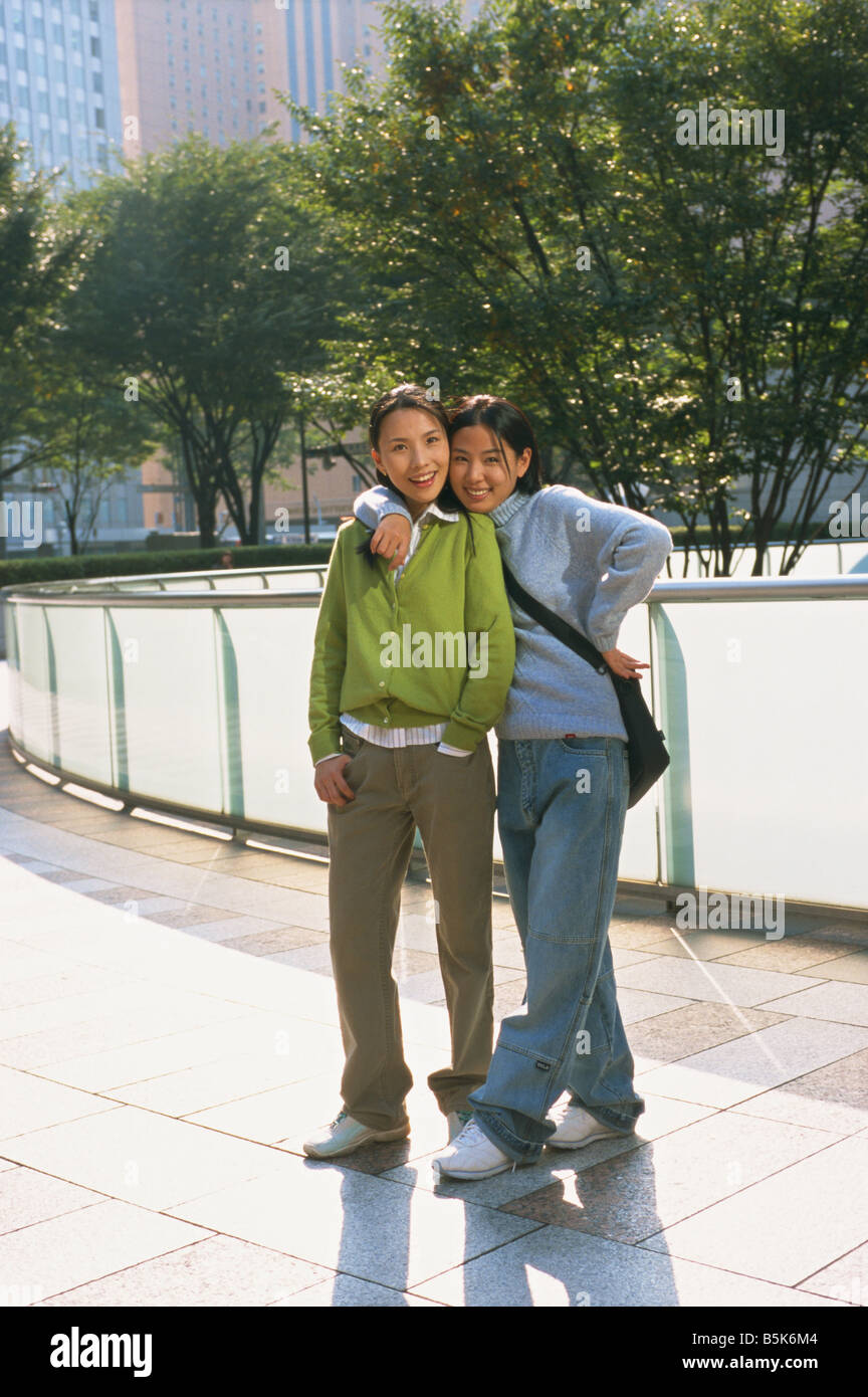 Two young Asian women Stock Photo - Alamy