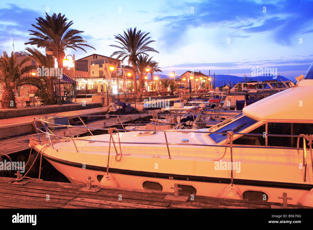 Latsi Latchi Harbour by night in the North of Cyprus Stock Photo - Alamy