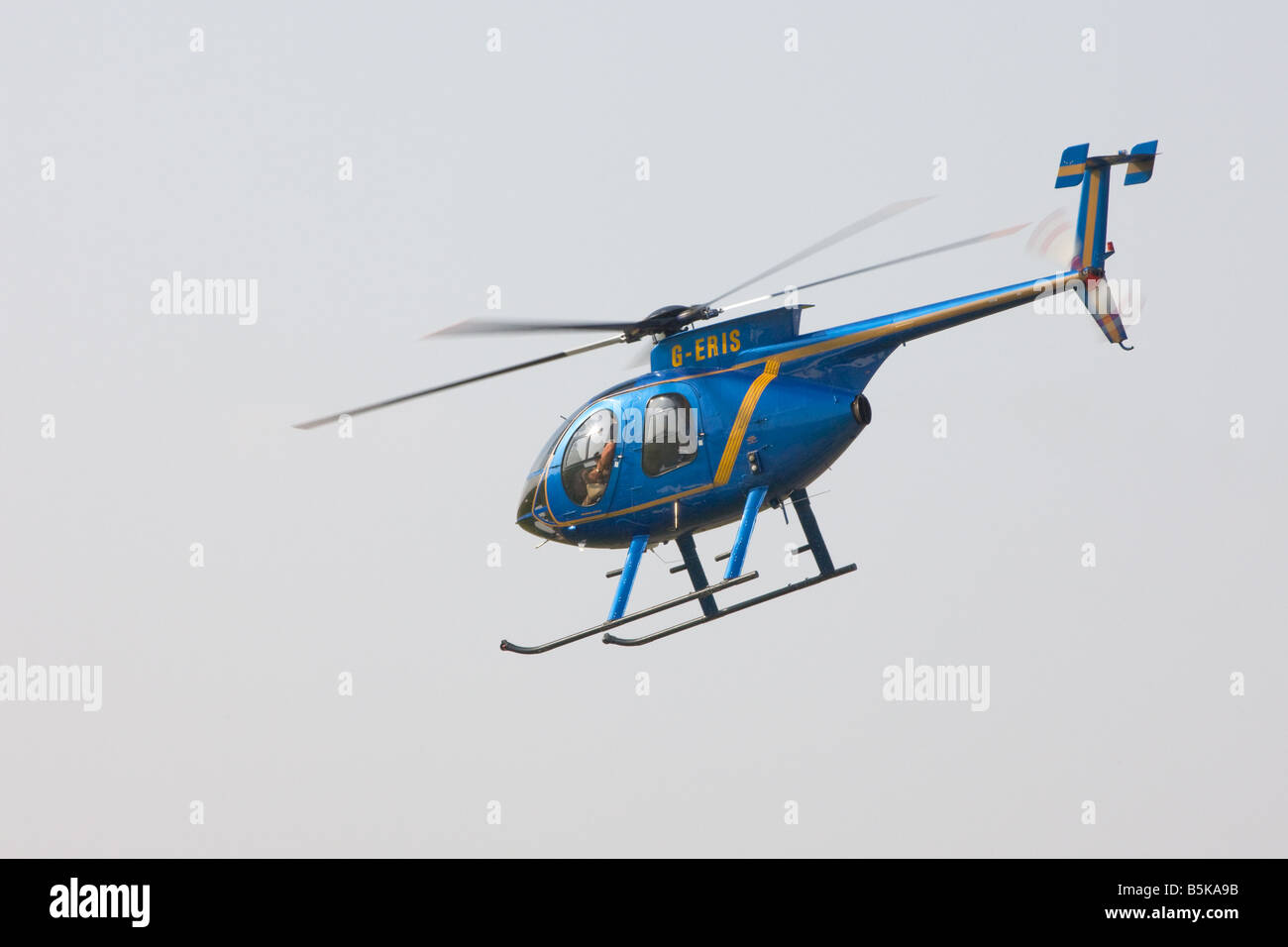 Hughes 369D 500 G-ERIS helicopter in flight at Sandtoft Airfield Stock ...