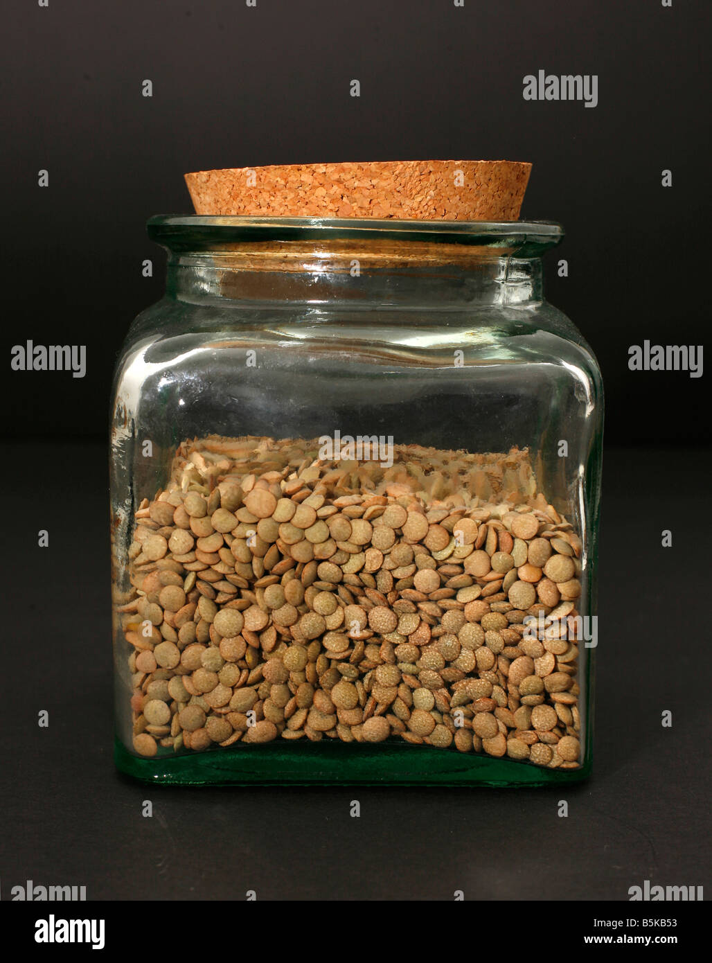 Display of dried lentils in transparent glass jar Stock Photo - Alamy