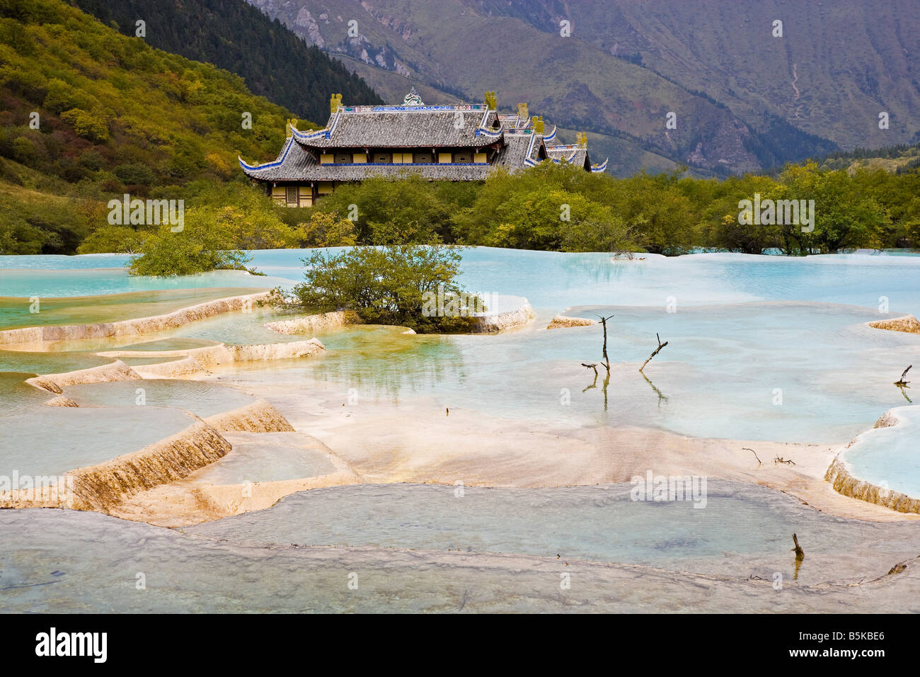Five Colour Pool travertine calcite terrace and Temple in Huanglong ...