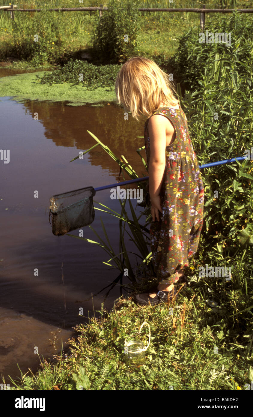Girl beside pond hi-res stock photography and images - Alamy