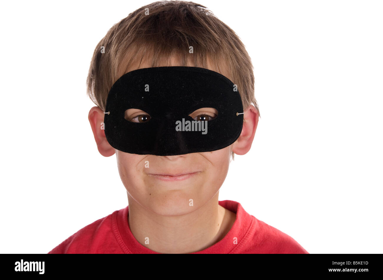 boy wearing a black hero mask isolated on white background Stock Photo ...