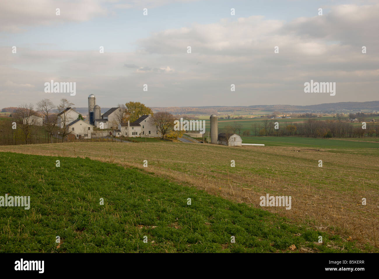 An Amish farm nestles in a valley near Lancaster, Pennsylvania. Other ...