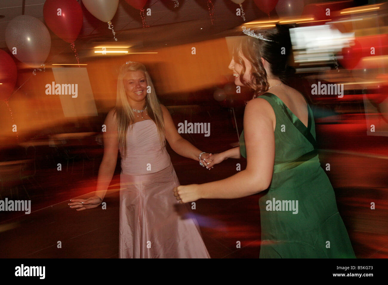 Teenage girls dancing at their High School Prom at Southampton Football ...
