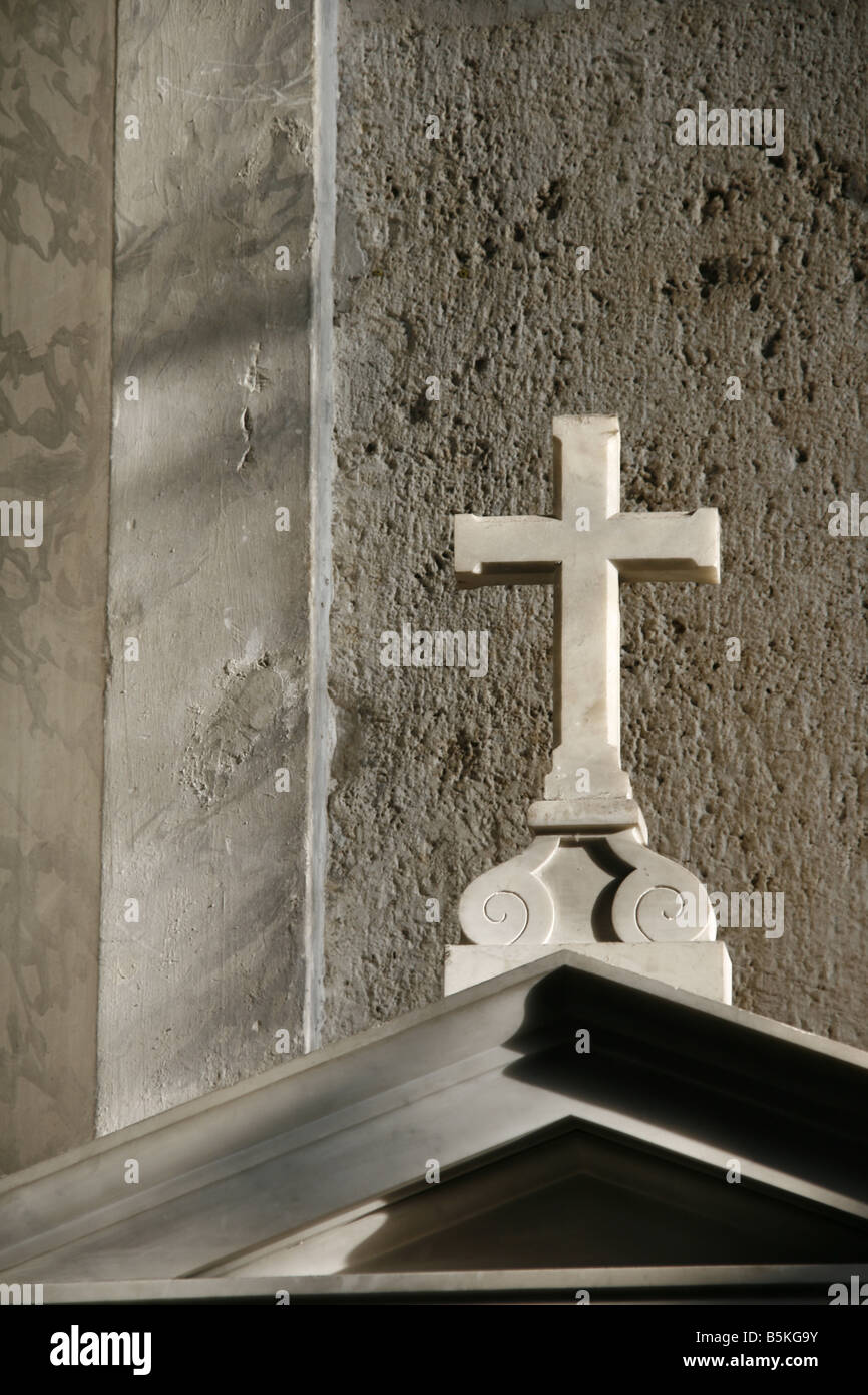 one marble stone cross inside church in rome italy Stock Photo - Alamy