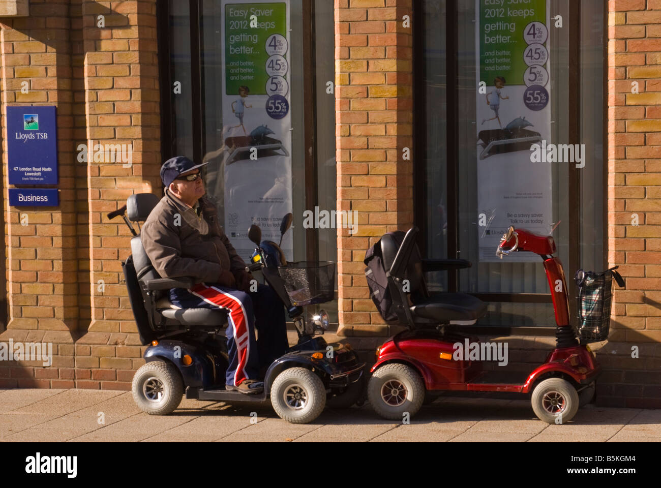 Elderly man person on mobility scooter hi-res stock photography and ...