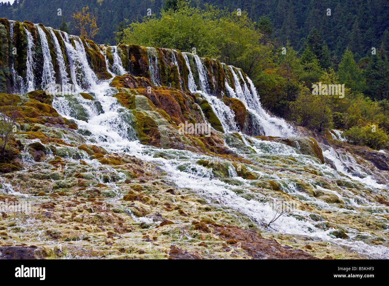 Travertine calcified waterfall in Huanglong Sichuan Province China ...