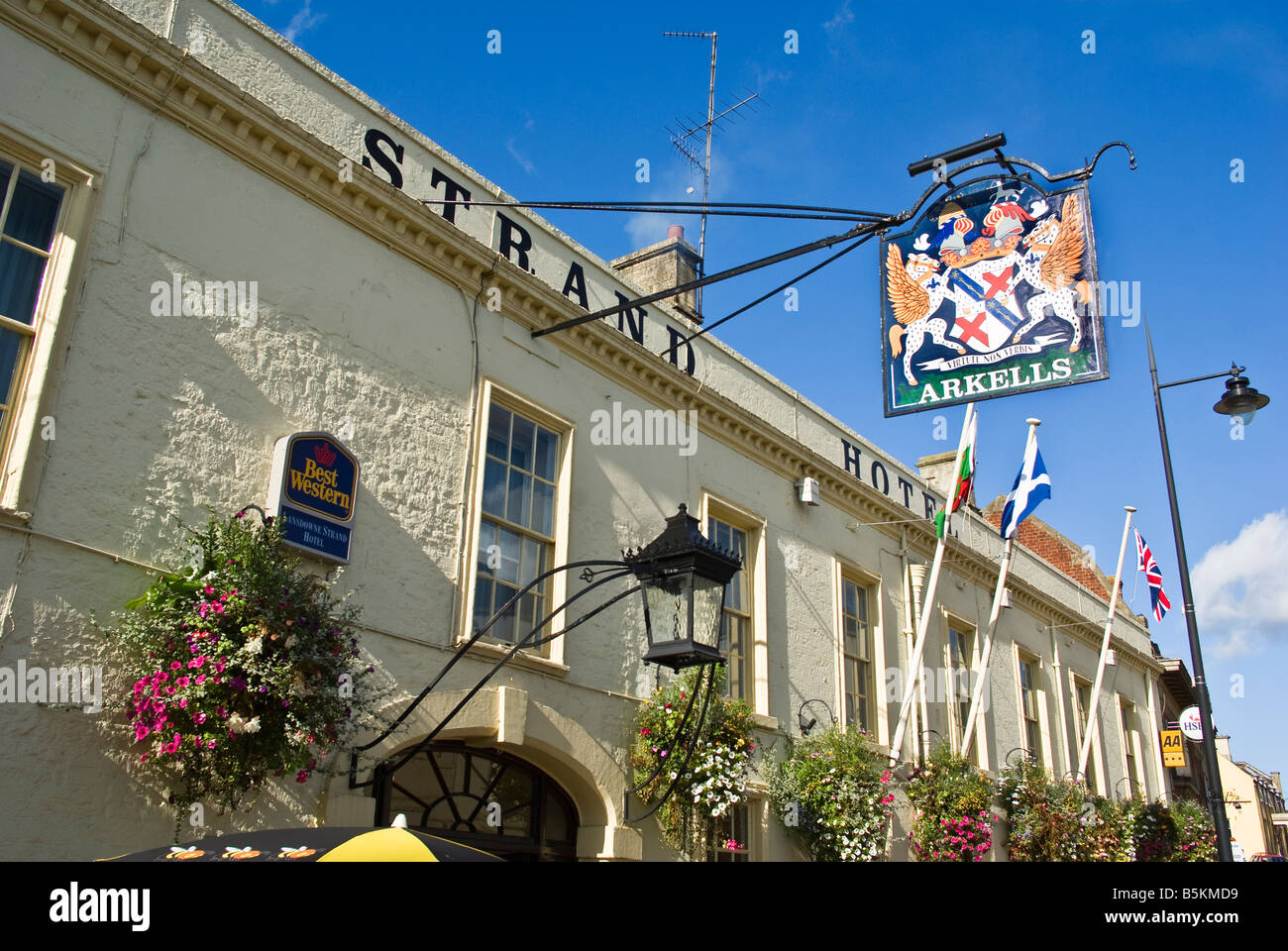 Front of Lansdowne Strand Hotel with hanging flower baskets in Calne ...