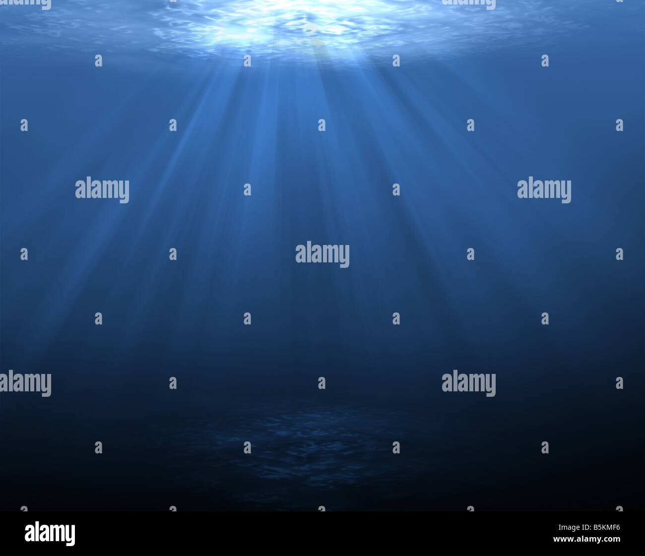 An underwater scene with sun rays shining under the surface Stock Photo ...