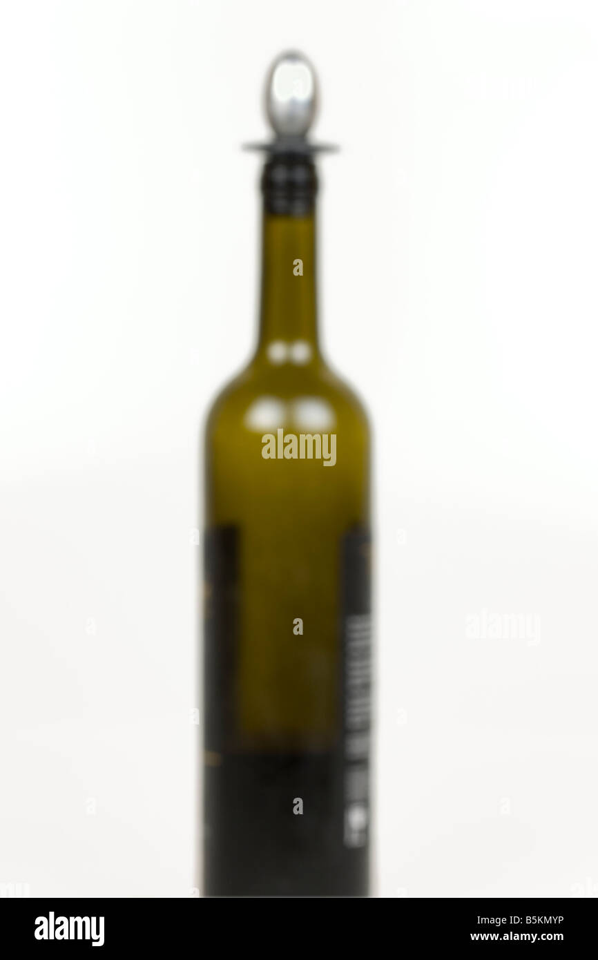 Blurred Green wine bottle with bottle stopper Stock Photo - Alamy