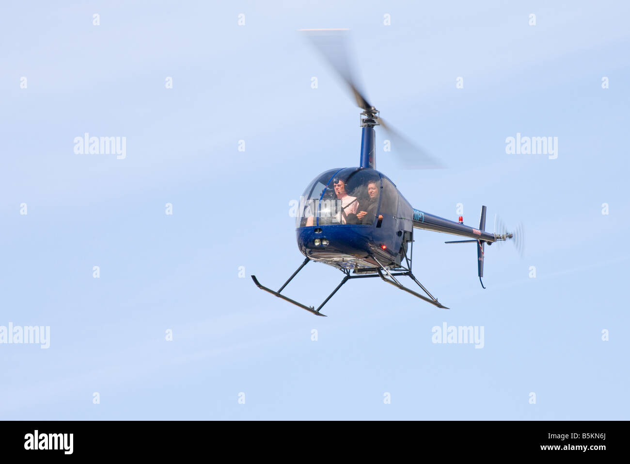 Robinson R22 Beta G-IIPT on final approach to land at Sandtoft Airfield ...
