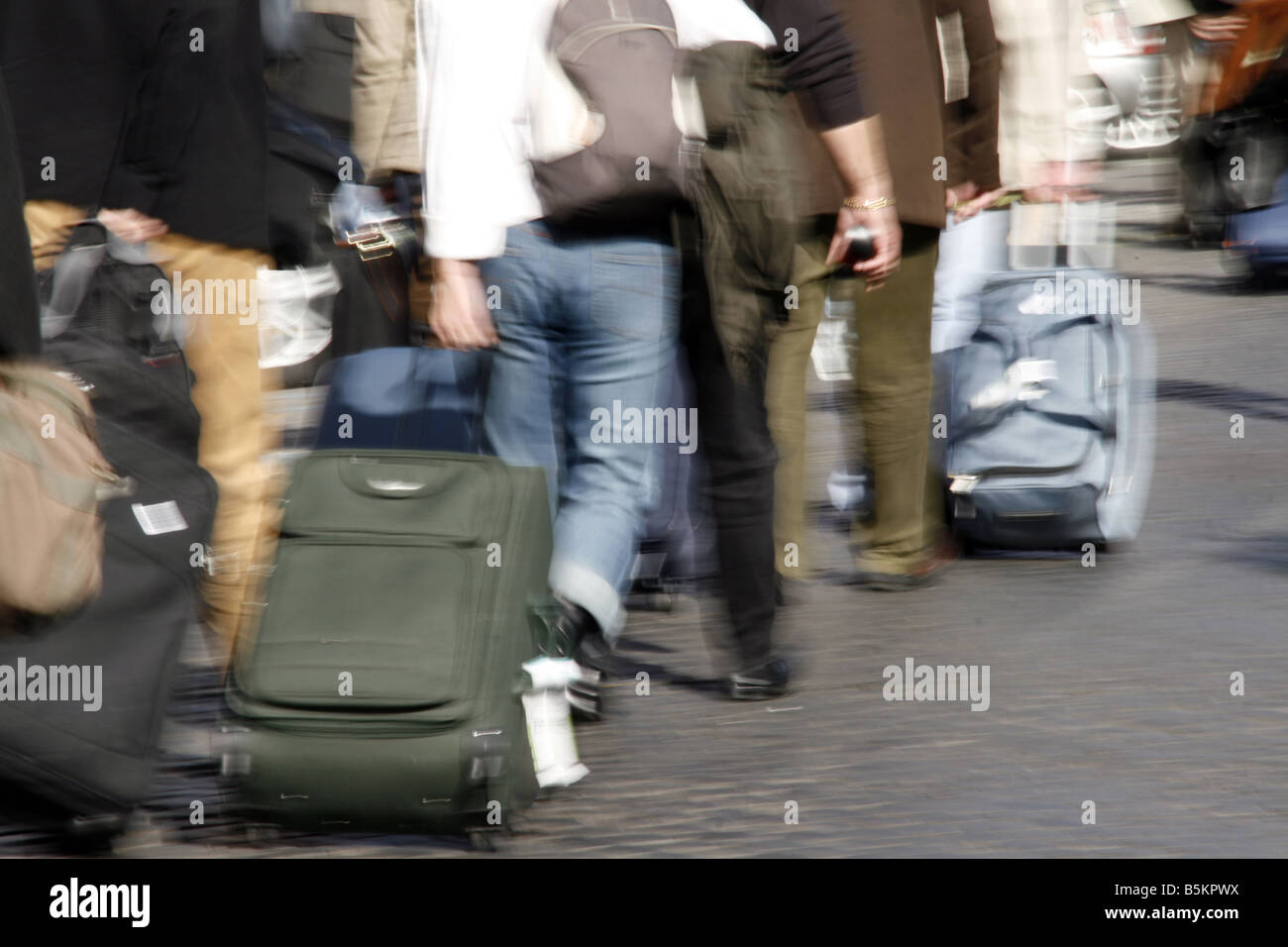 Group people walk suitcases hi-res stock photography and images - Alamy