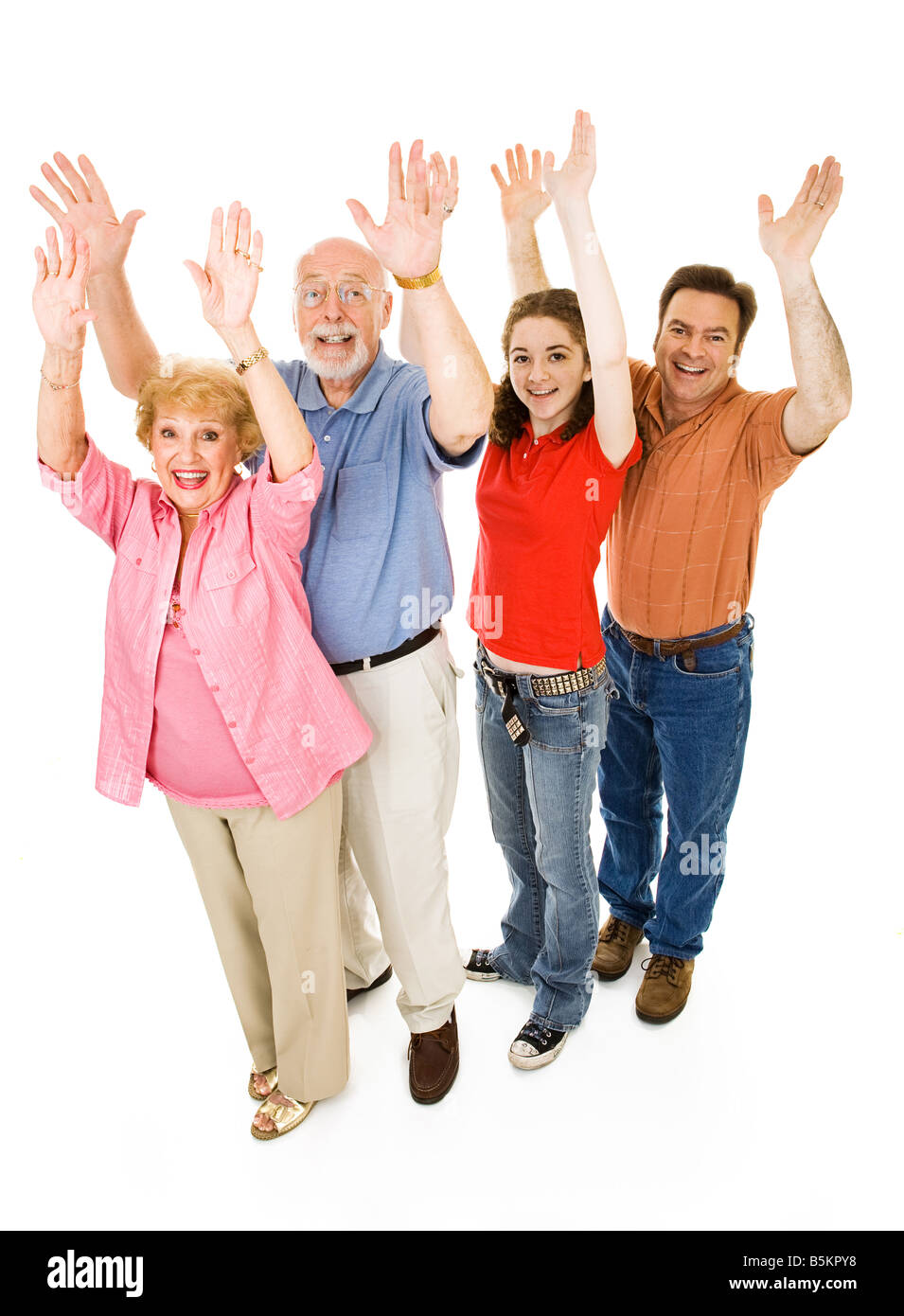 Extended family of grandparents father and teen daughter all giving a ...