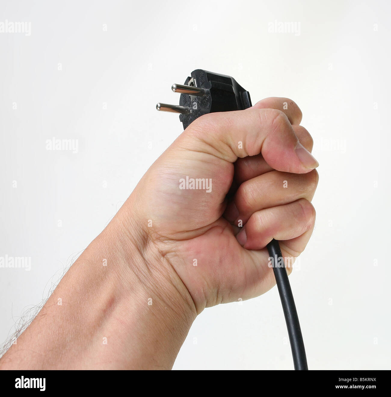 Hand holding plug hi-res stock photography and images - Alamy