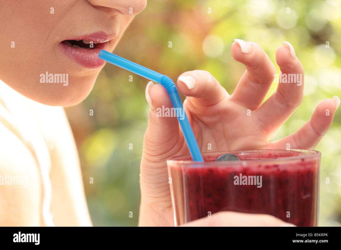 Young Woman Drinking Smoothie Model Released Stock Photo - Alamy