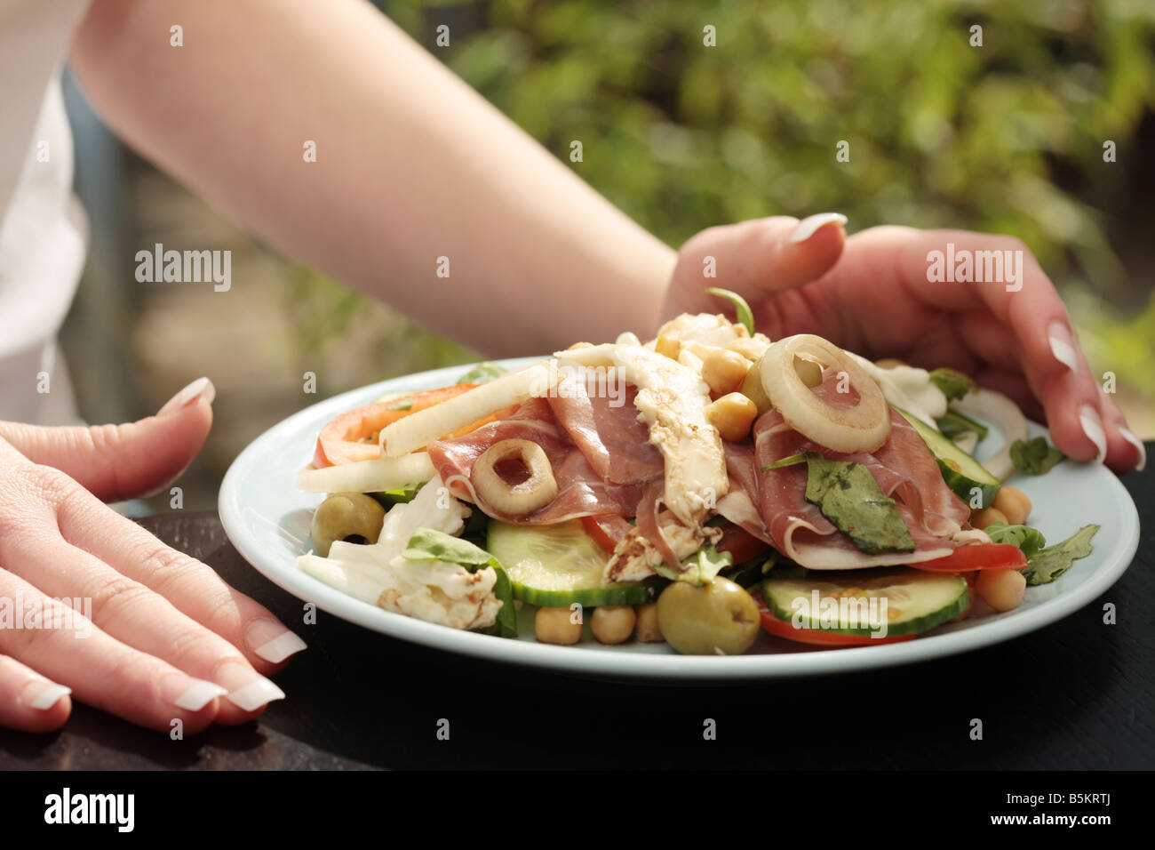 Young Woman with Italian Salad Model Released Stock Photo - Alamy