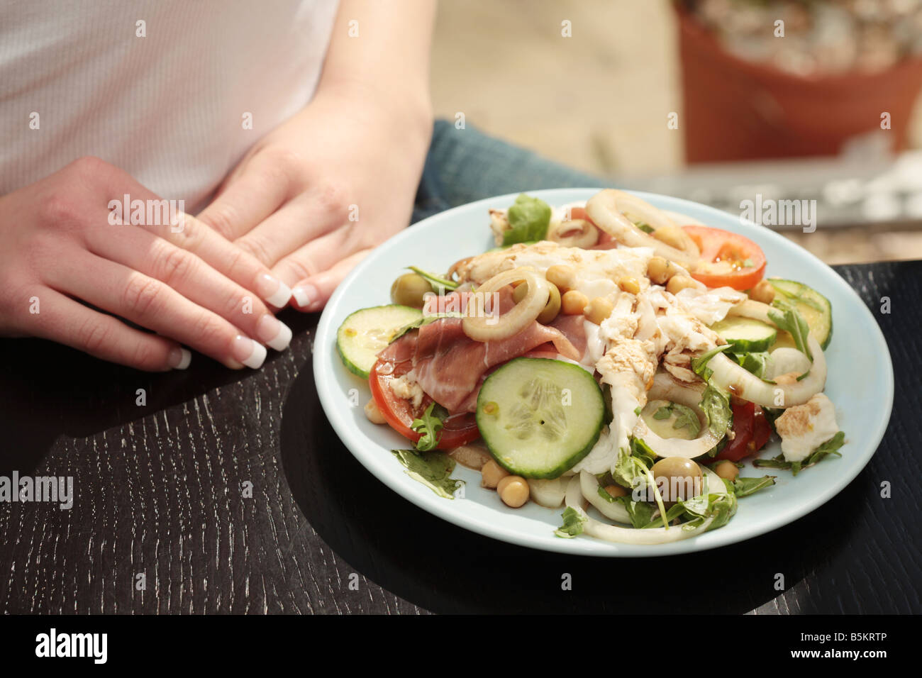 Young Woman with Italian Salad Model Released Stock Photo - Alamy