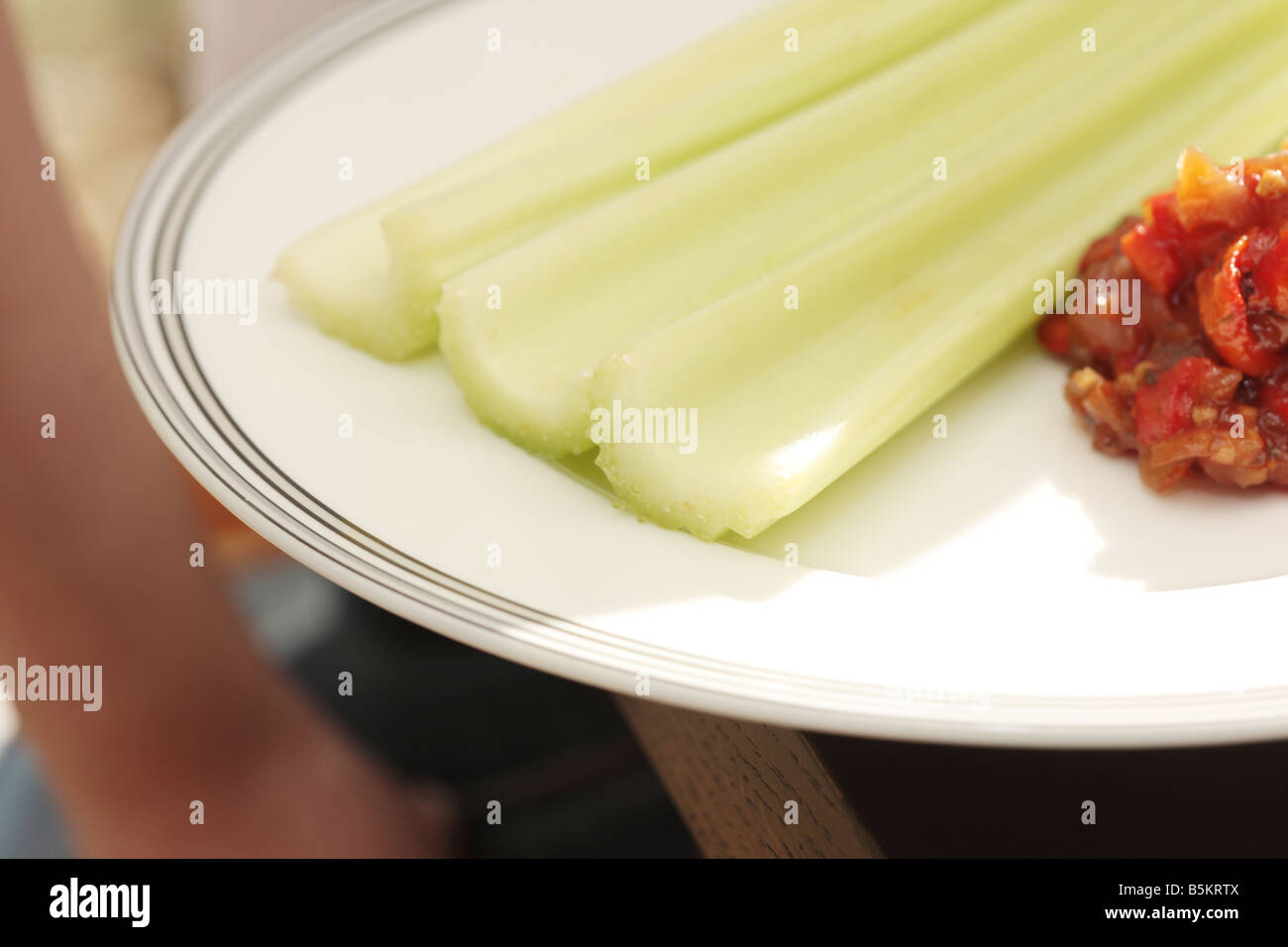Celery with Salsa Stock Photo - Alamy