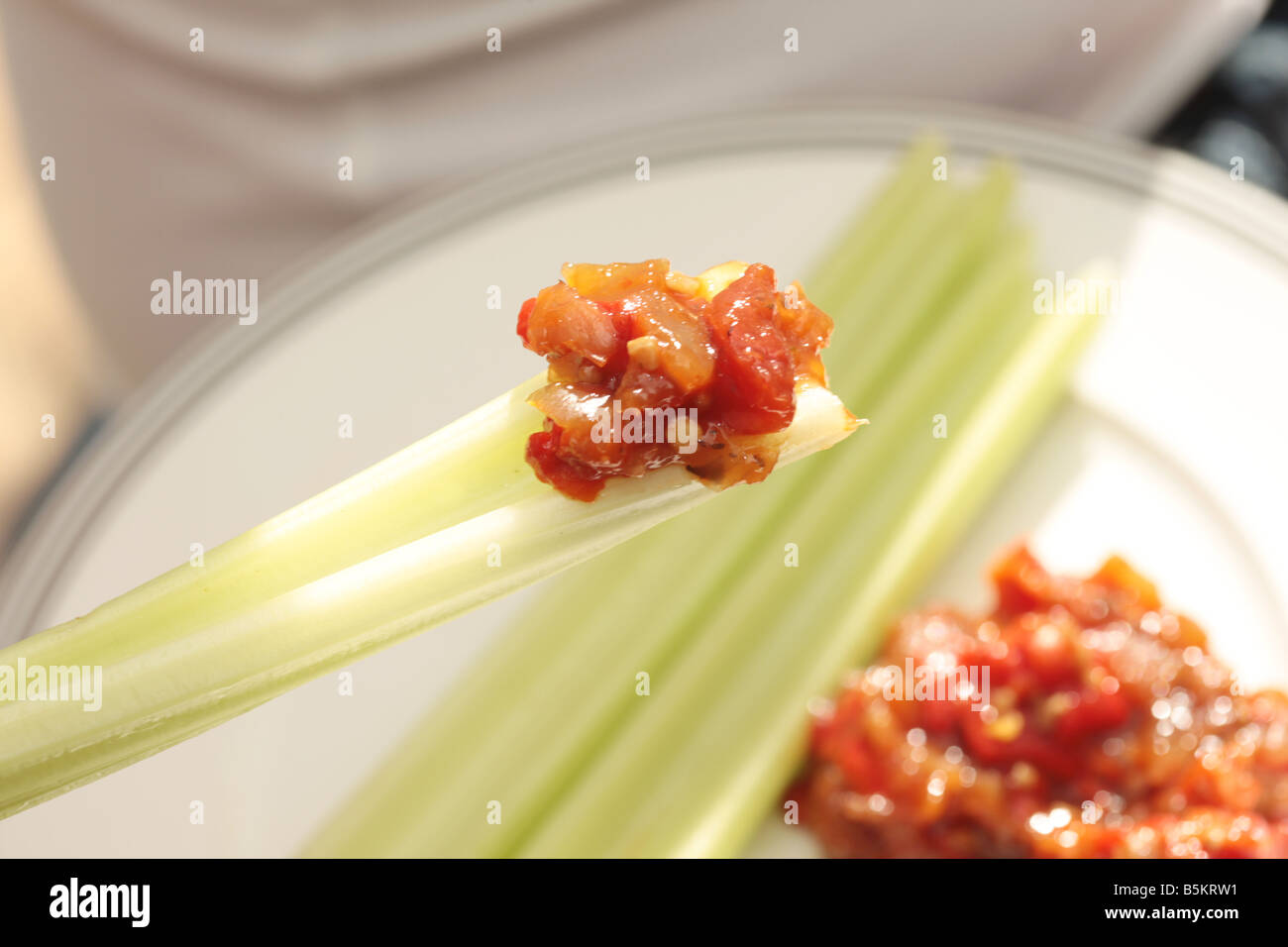 Celery with Salsa Stock Photo - Alamy