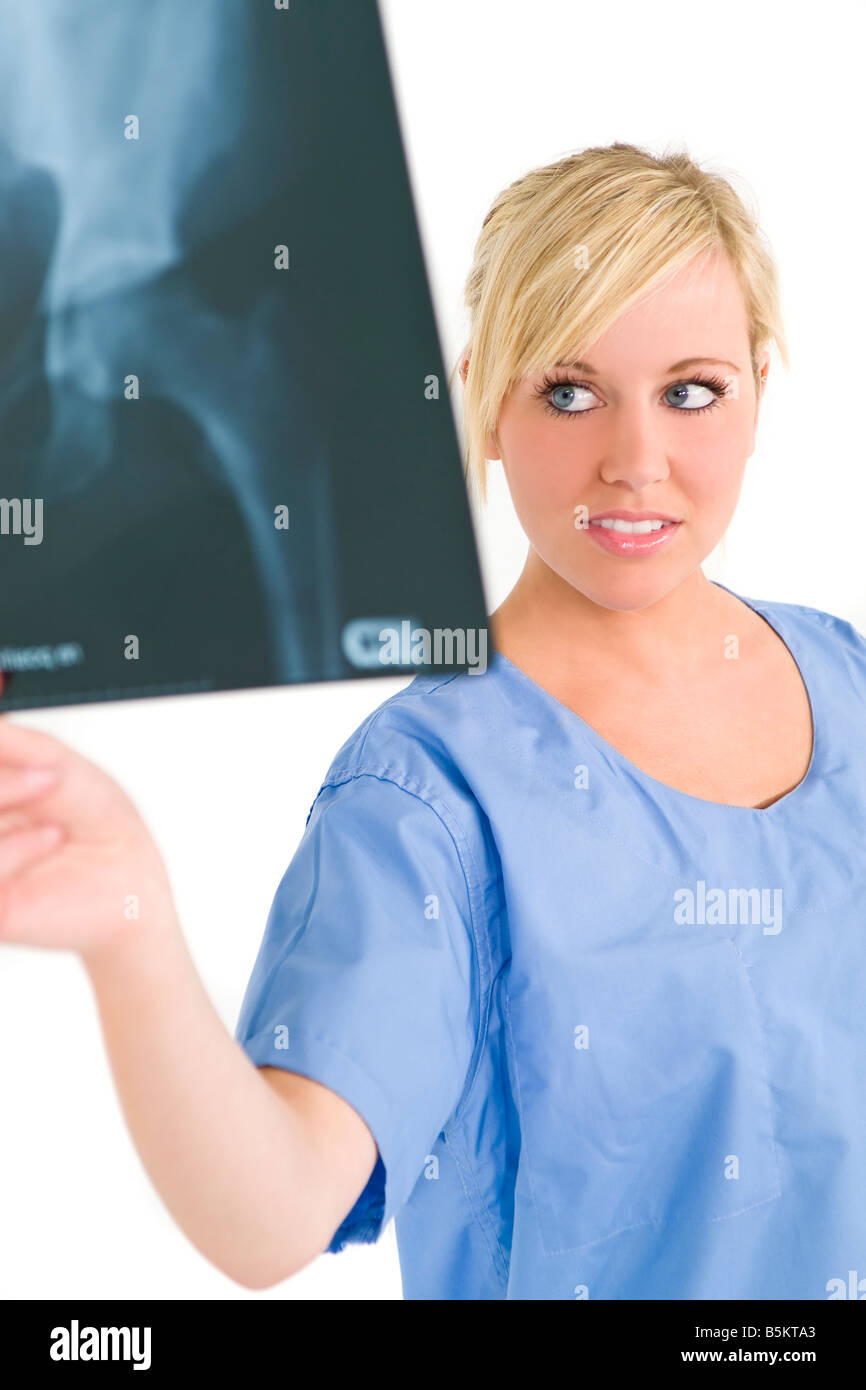 A female doctor examining an X ray of a human hip Stock Photo - Alamy