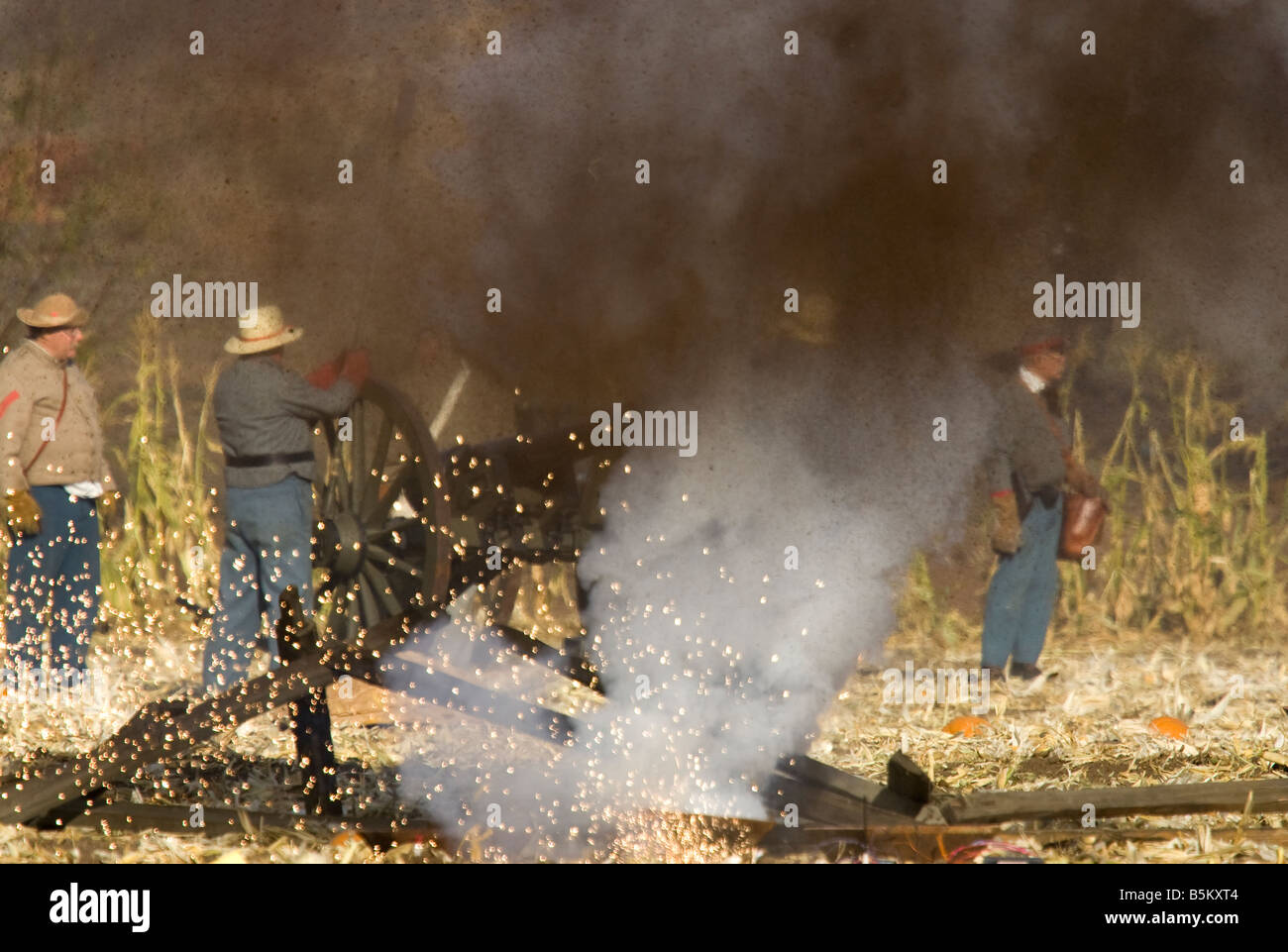 Exploding Canon Shell and Flying Dirt Stock Photo - Alamy