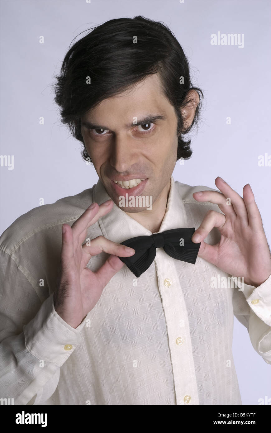 Straightening bow tie hi-res stock photography and images - Alamy