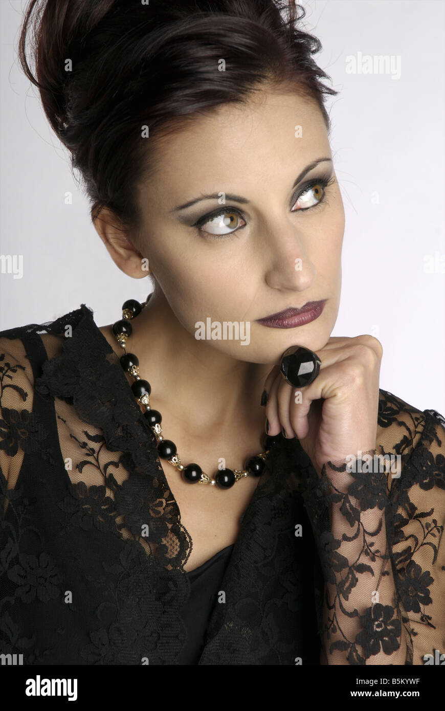 Woman wearing black lace Stock Photo - Alamy