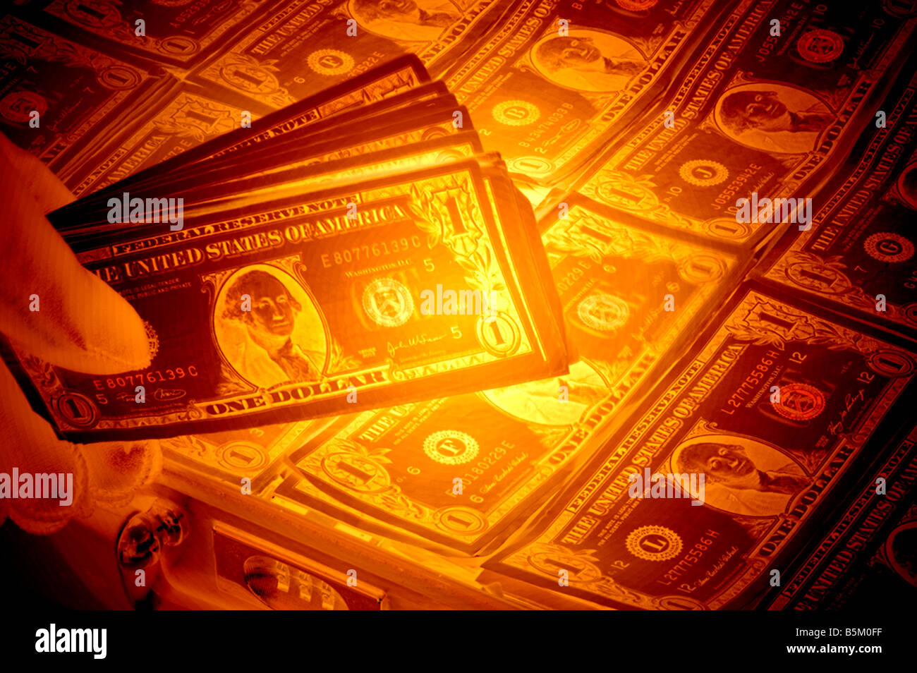 Hand full of money hi-res stock photography and images - Alamy
