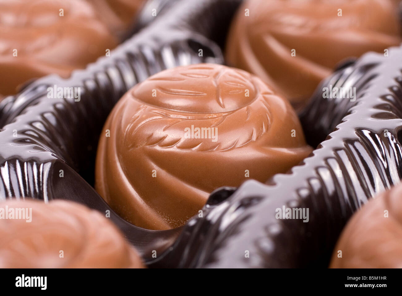 chocolates candy in a box Stock Photo - Alamy