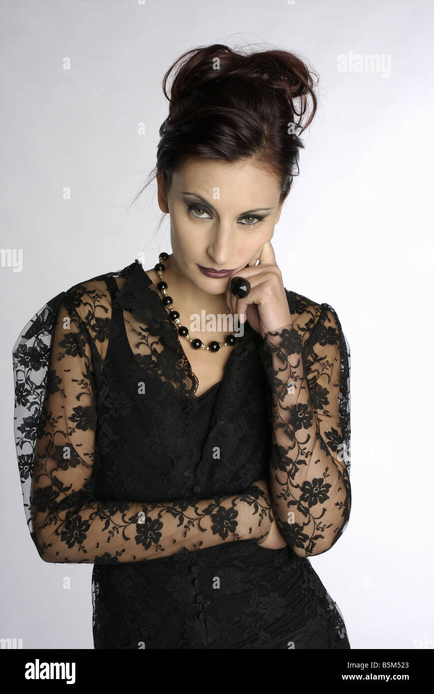 Woman wearing black lace Stock Photo - Alamy
