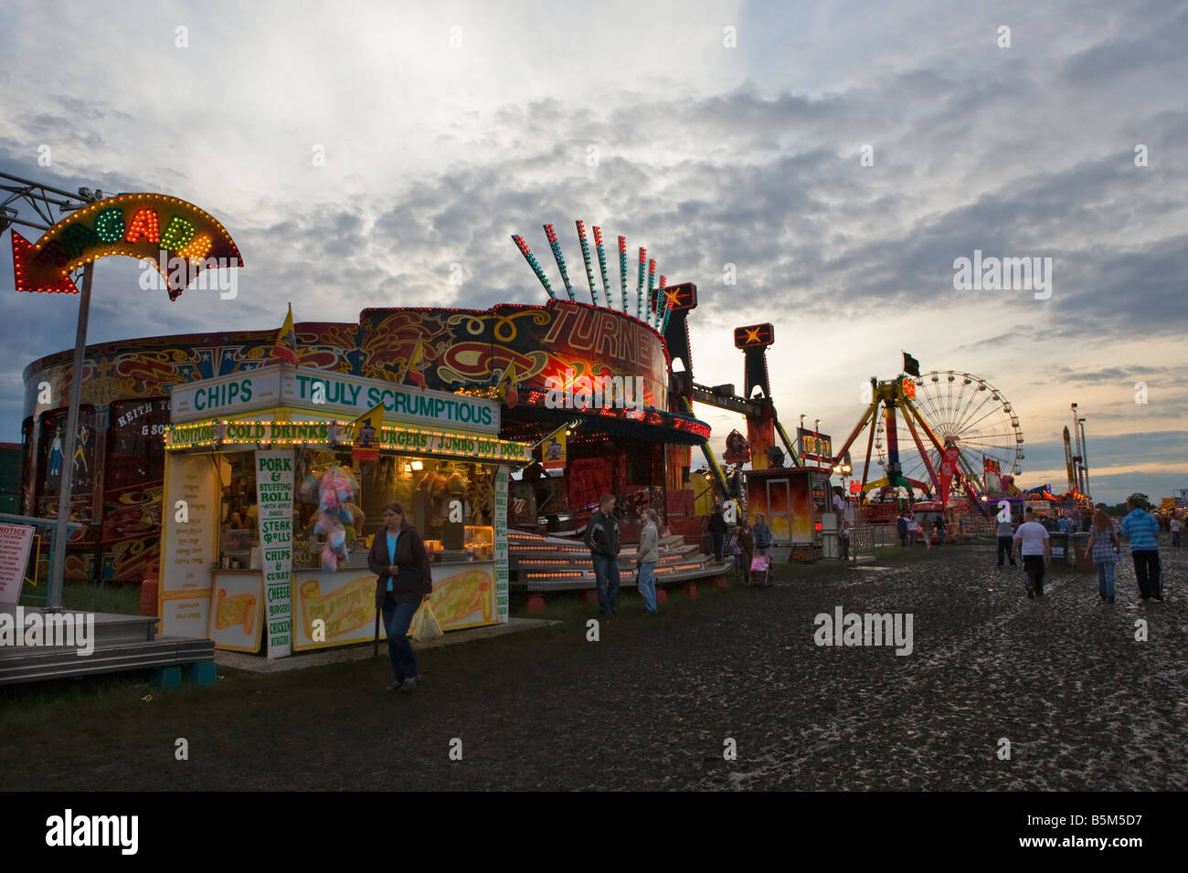 A funfair at sunset (specifically 'The Hoppings' annual fair on ...