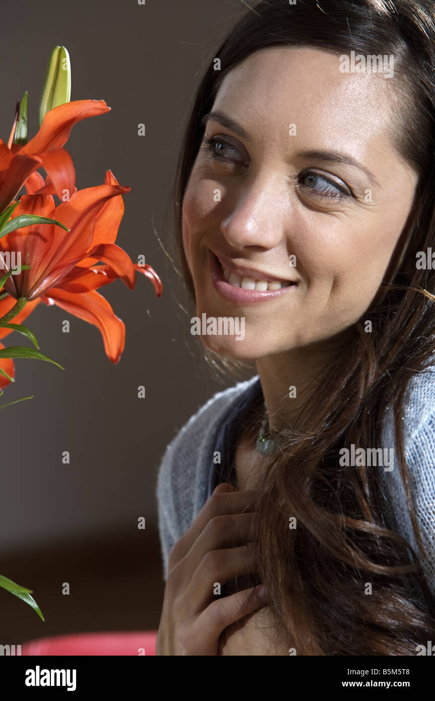 Young man giving flowers to a woman Stock Photo - Alamy Young man giving flowers to a woman Stock Photo - Alamy