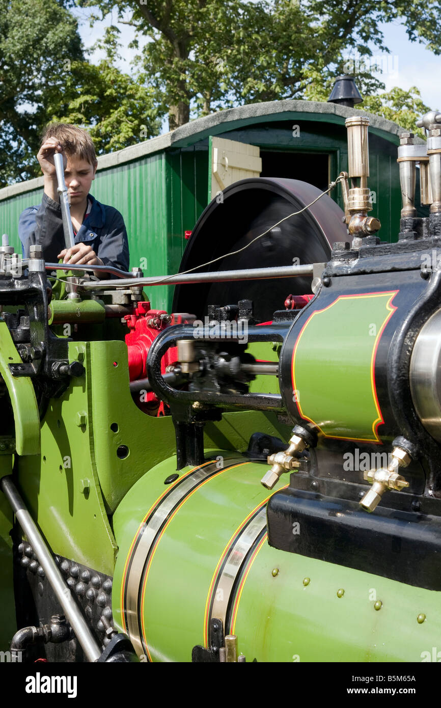 boy operating steam traction engine at the astle park rally Stock Photo ...