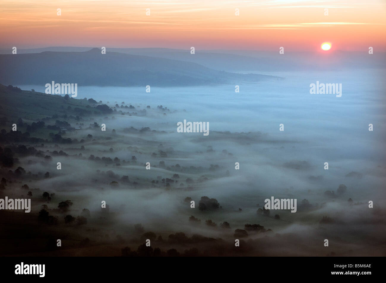 sunrise over the castleton valley looking towards lose hill and win ...