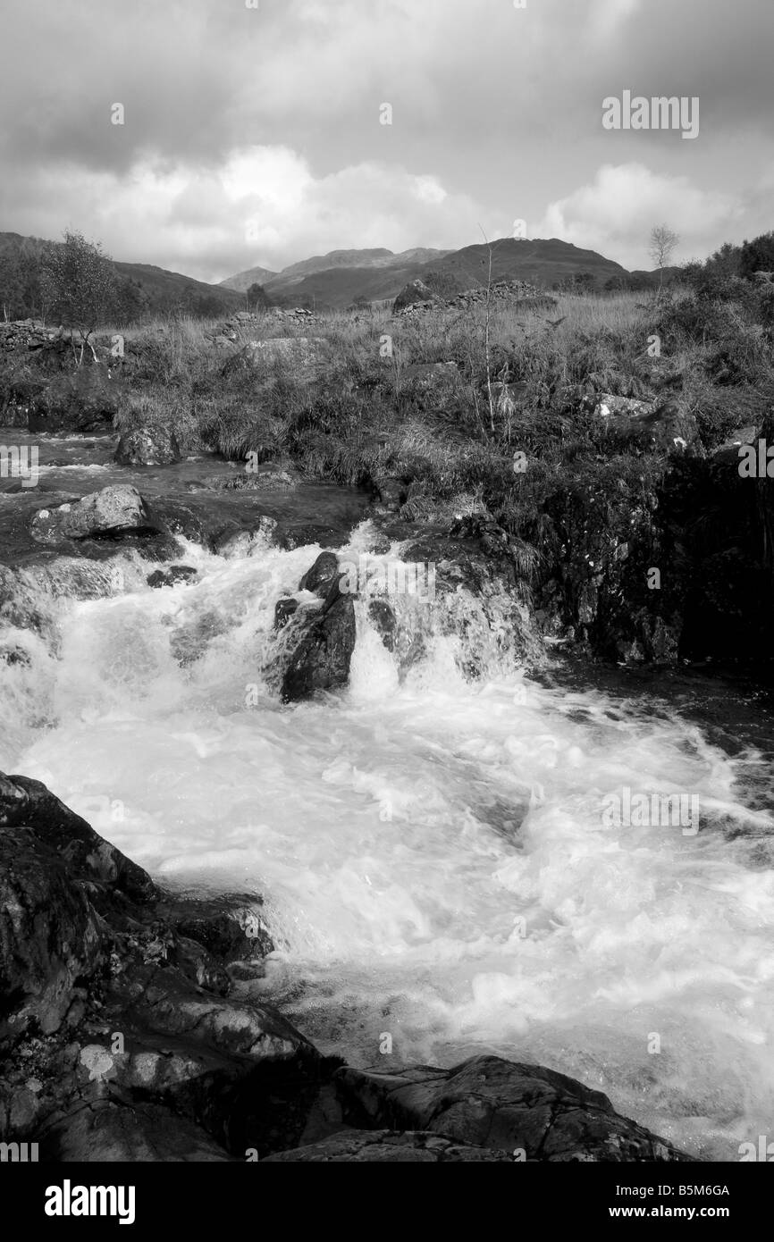 lakeland monochrome landscape showing rapids at birks bridge in the ...