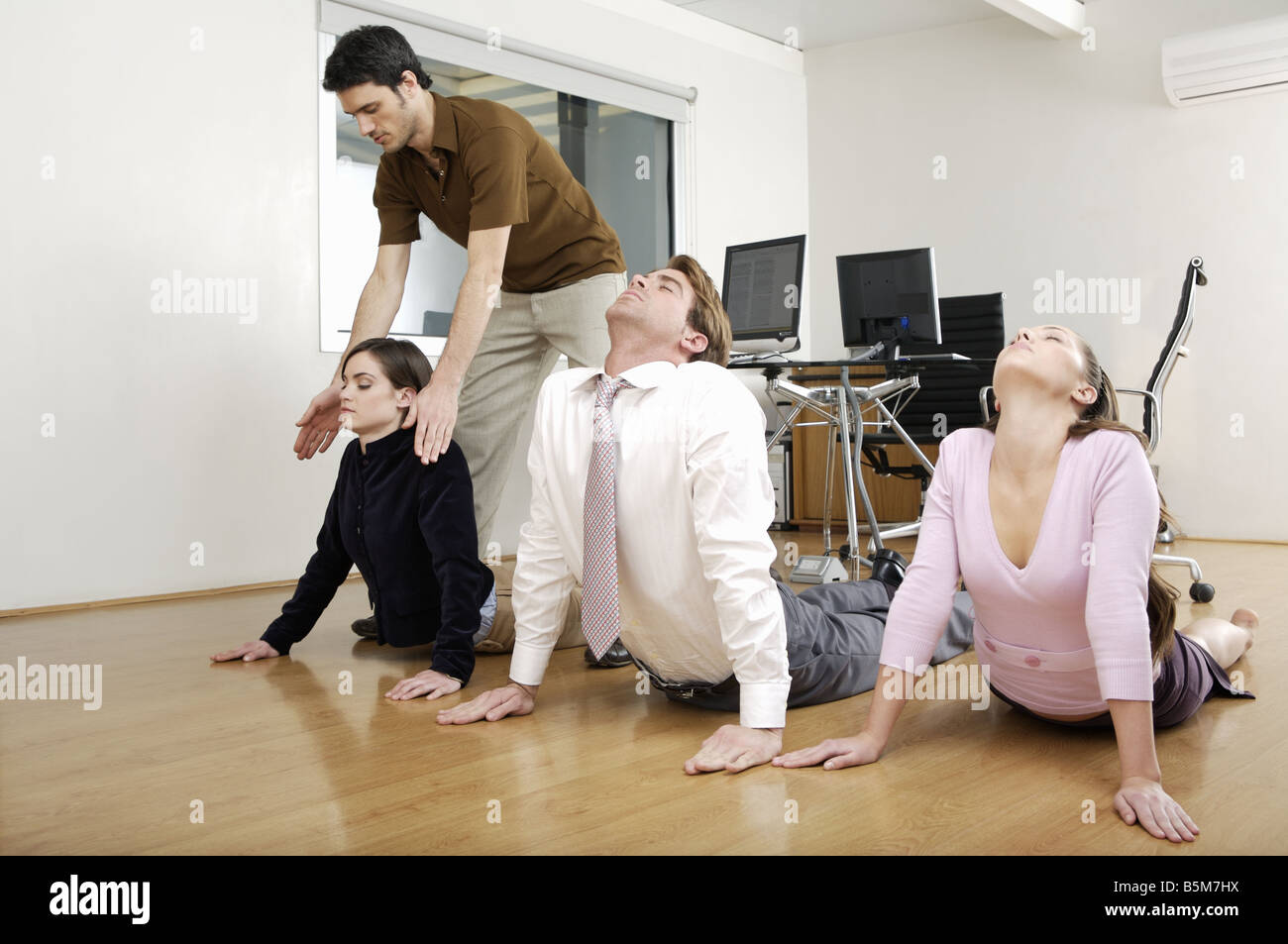Yoga session at business meeting Stock Photo - Alamy
