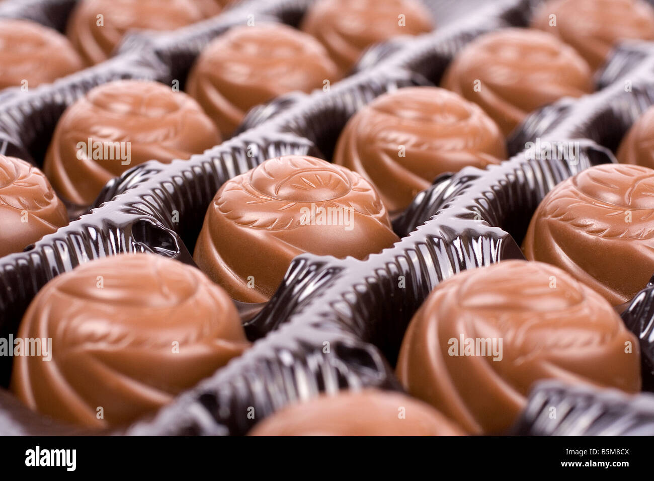chocolates candy in a box Stock Photo - Alamy
