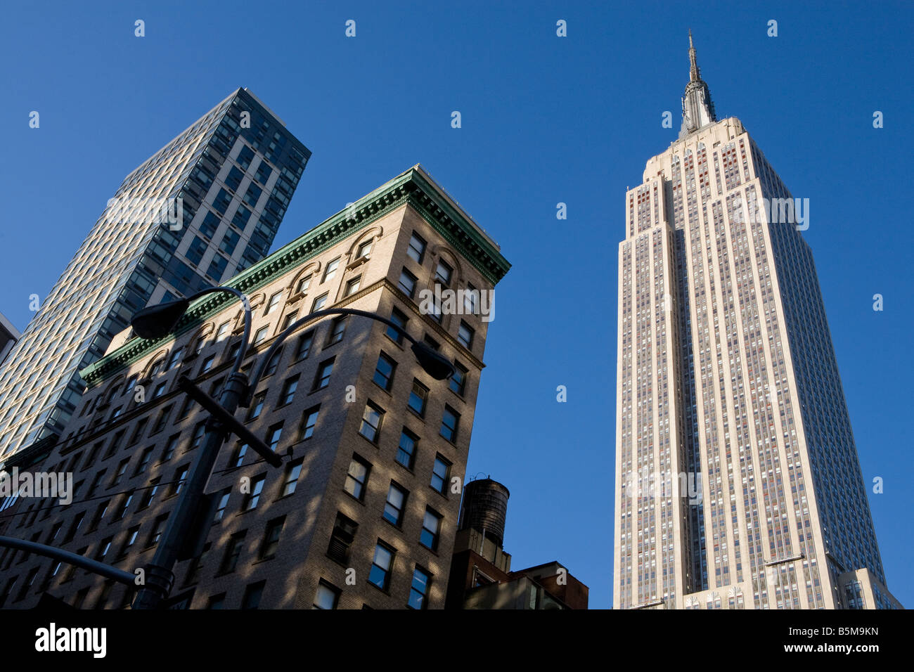 The Empire State Building with smaller buildings in foreground, Fifth ...
