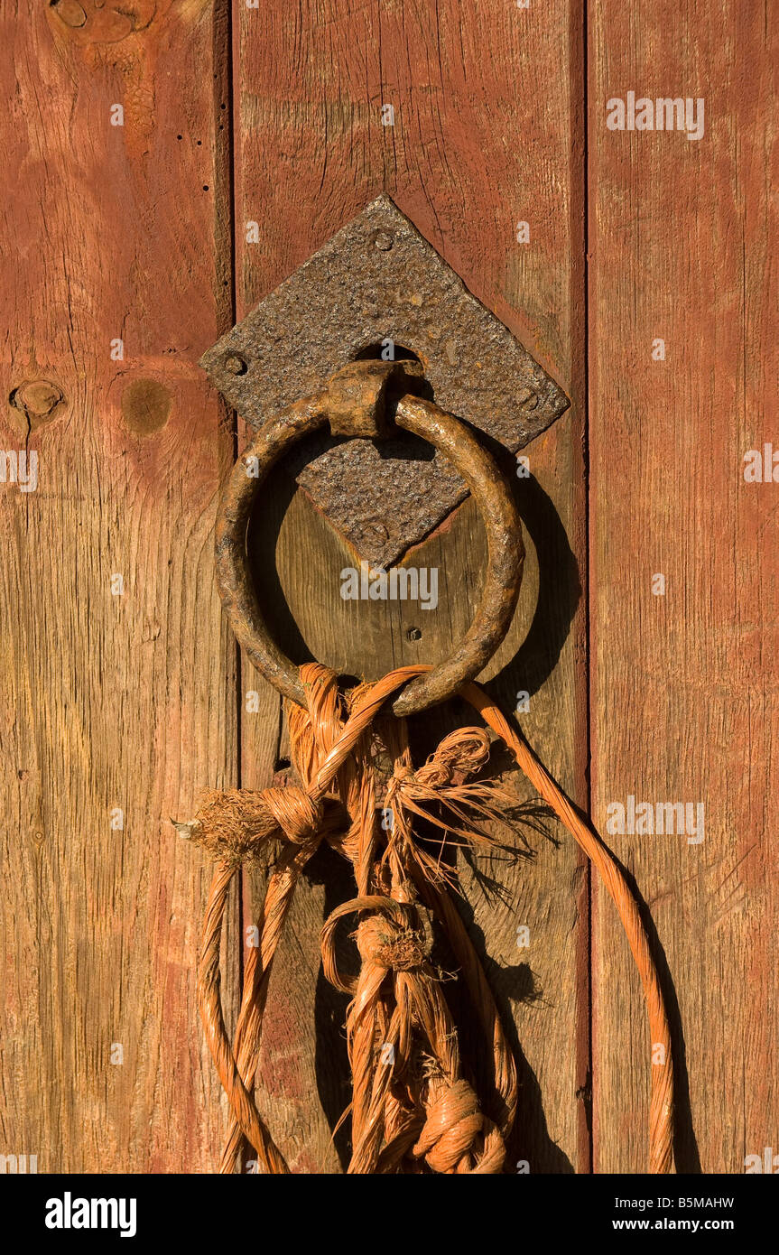 Old rusty ring handle on barn door close up England UK United Kingdom ...