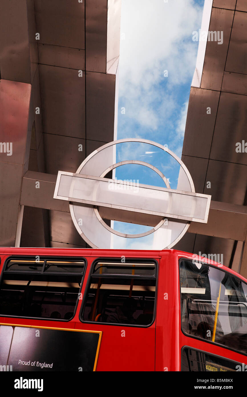 London red double decker bus with underground subway sign above Stock ...