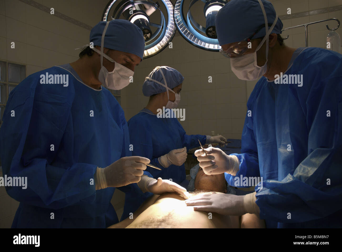 Doctors at surgery room Stock Photo - Alamy