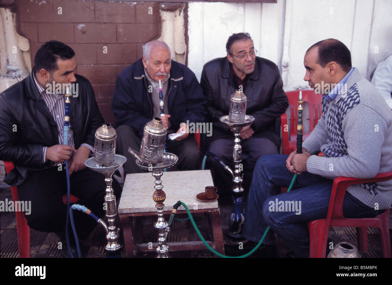 Tripoli Libya people sitting at an outdoor cafe smoking sheesha a ...