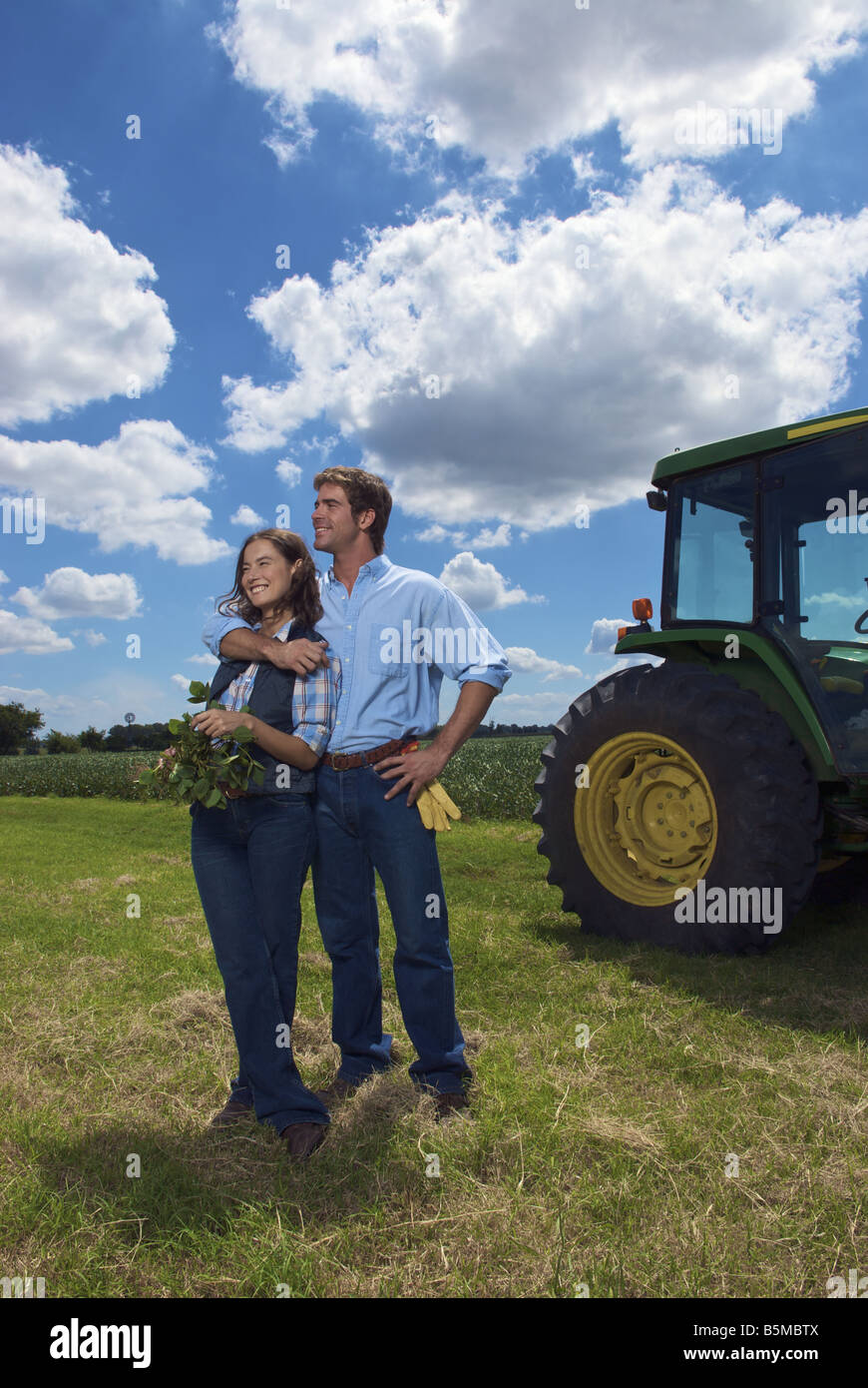 A young couple on the farm Stock Photo - Alamy