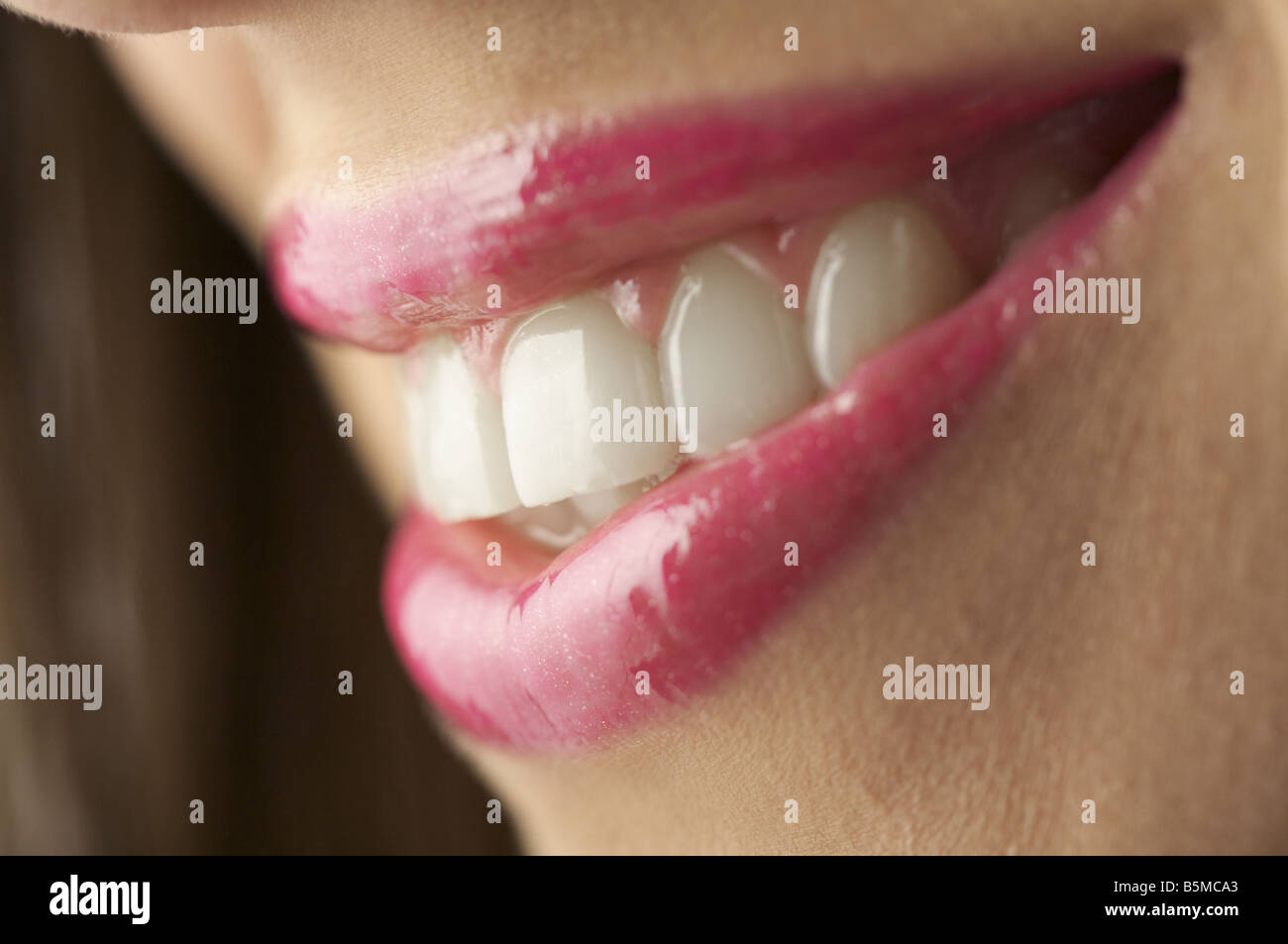 A smiling woman's mouth Stock Photo - Alamy
