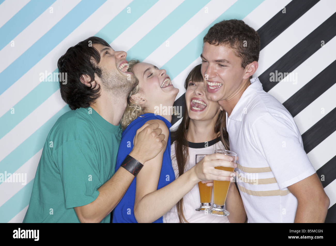 A small group of teenagers having fun Stock Photo - Alamy