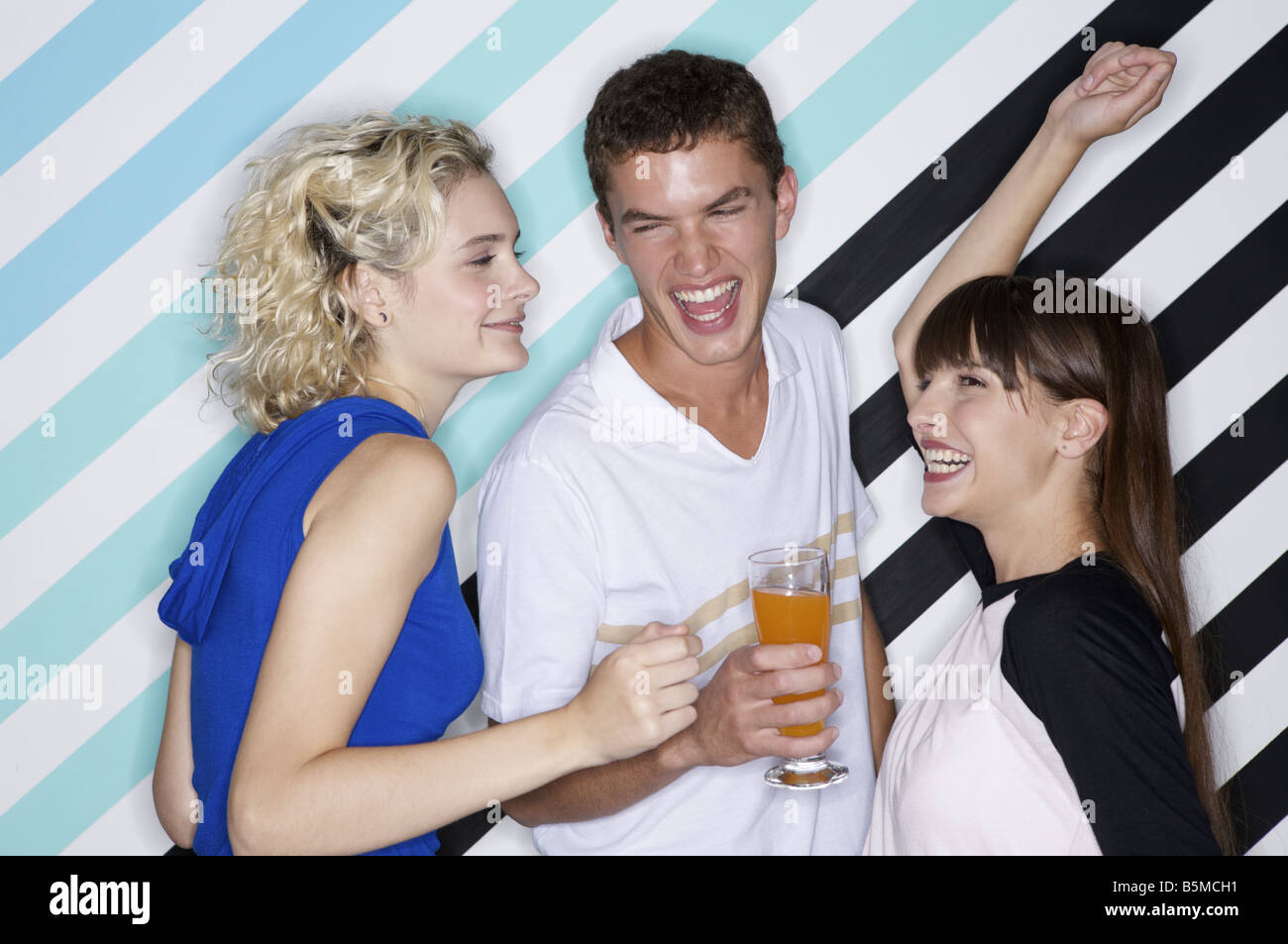 A small group of teenagers having fun Stock Photo - Alamy
