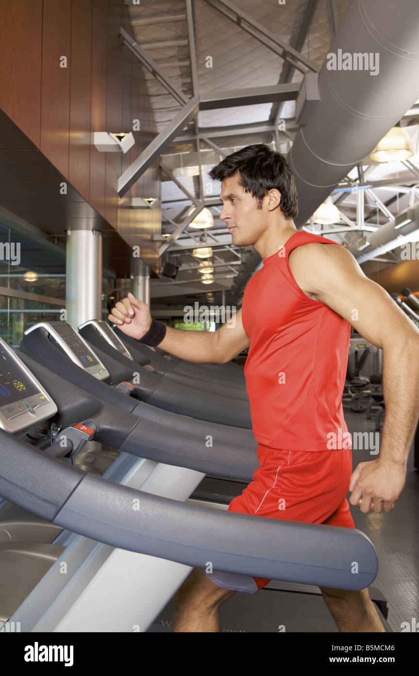 Serious man on treadmill hi-res stock photography and images - Alamy