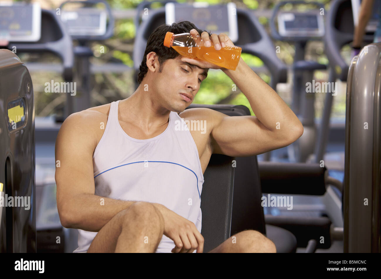 A man wiping his head Stock Photo - Alamy
