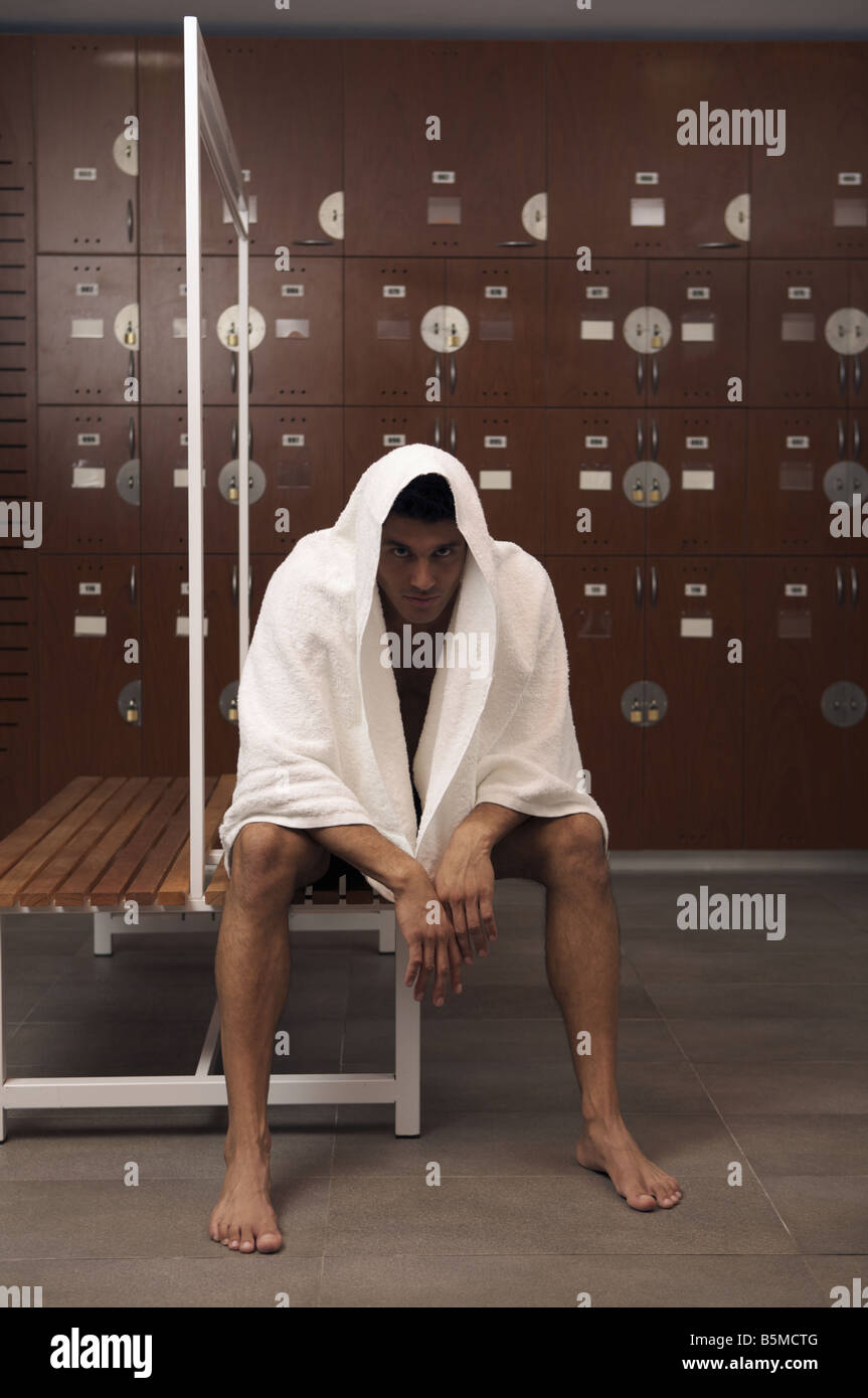 A man resting in the locker room Stock Photo - Alamy